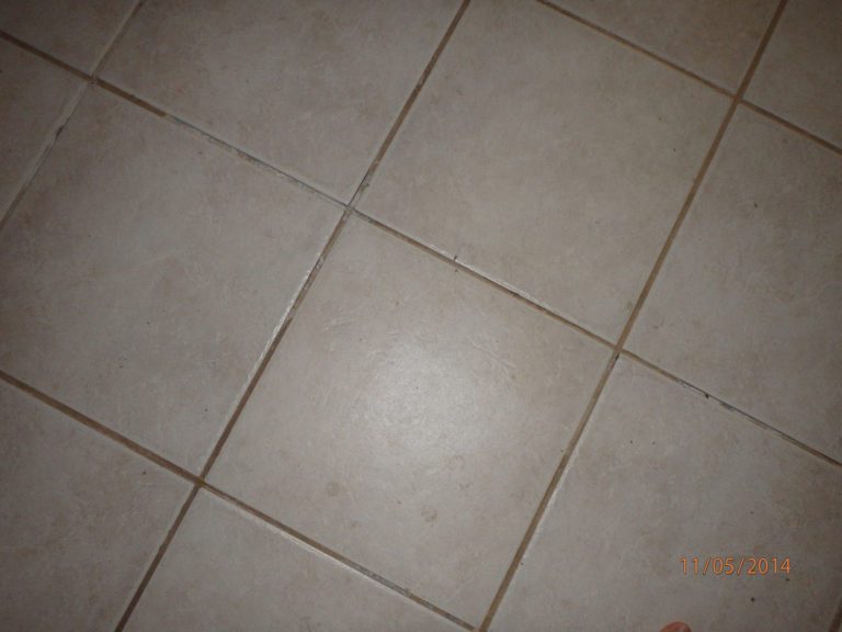 Replace A Cracked Floor Tile Without Damaging The Rest - The DIY Life