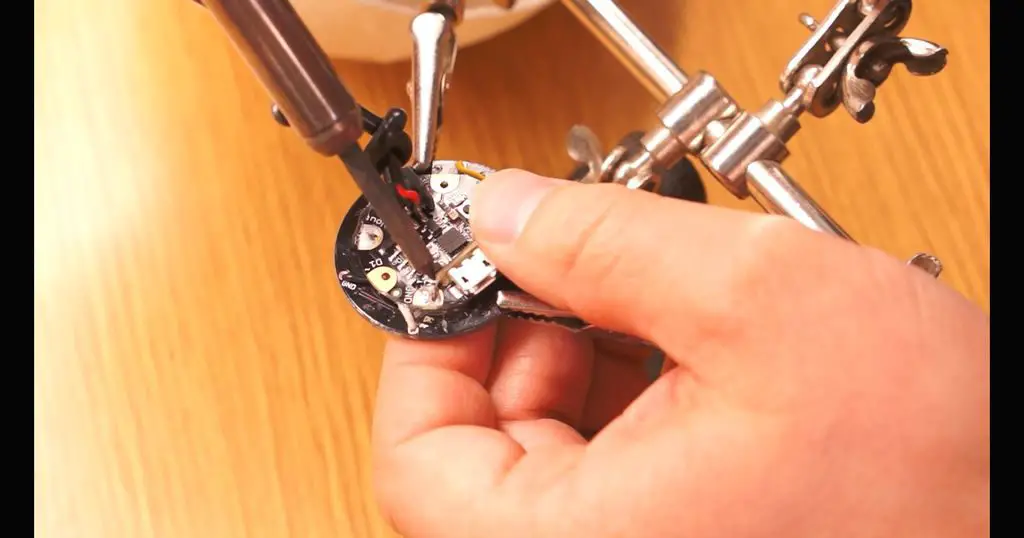 soldering the LED ring onto the Arduino | The DIY Life